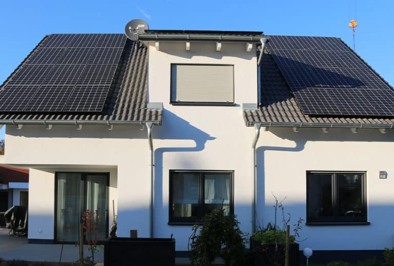 PV system with SolidRail and stainless steel roof hooks - K2 Systems