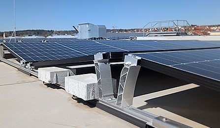 Save on ballast with roof anchors on flat roofs - K2 Systems